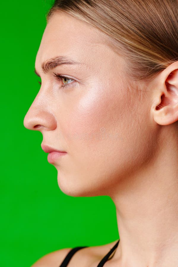 Close Up Portrait of Woman with Green Background in Studio Stock Image ...
