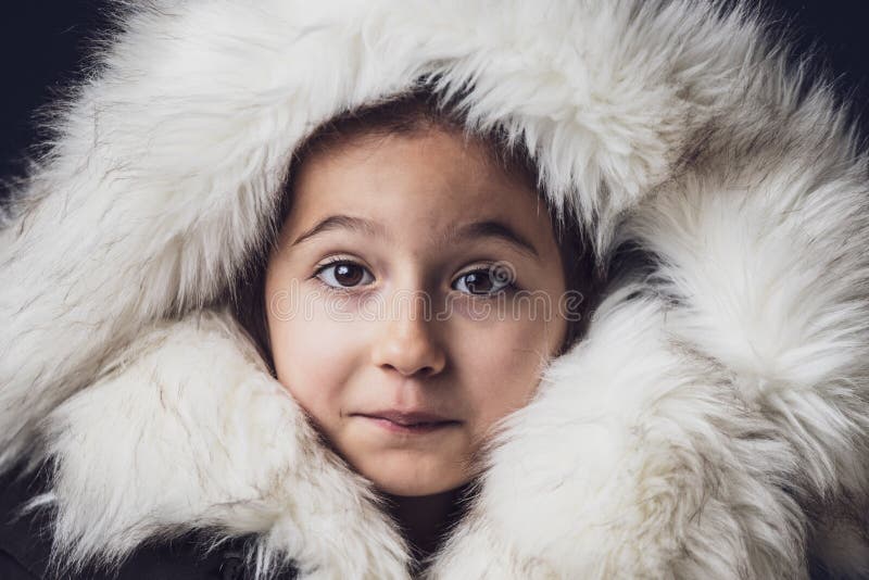 Close Up Portrait of a Young Girl Dressed with an Eskimo Jacket Stock ...