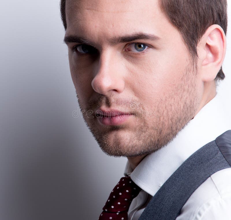 Close-up Portrait of a Young Man in Suit. Stock Photo - Image of ... Close-up Portrait of a Young Man in Suit. Stock Photo - Image of ...