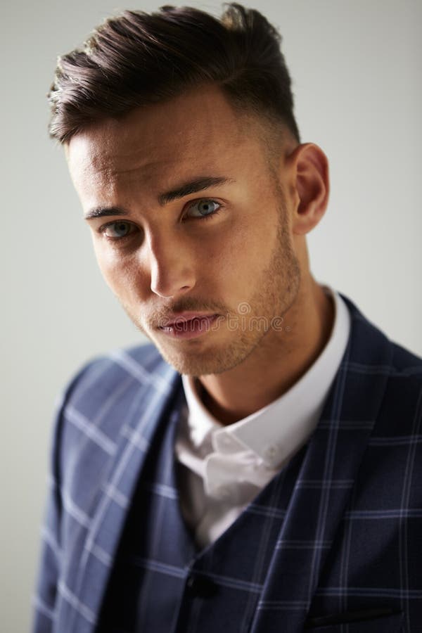 Close-up Portrait of Young Man Wearing Suit, Face in Shadow Stock Image ...