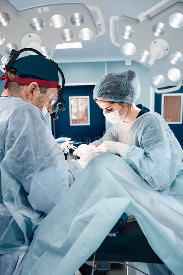 Close-up Portraits of Surgeons during Plastic Surgery. Stock Photo ...