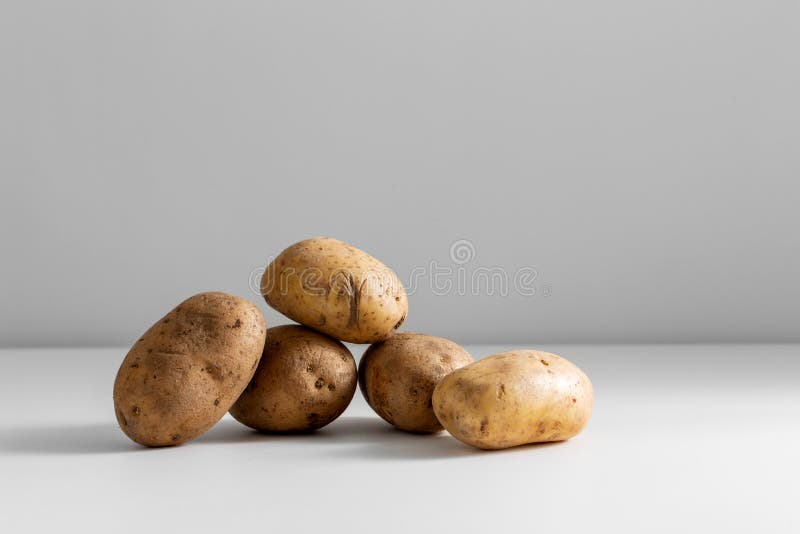 Close Up of Potatoes on Table Stock Image - Image of concept ...
