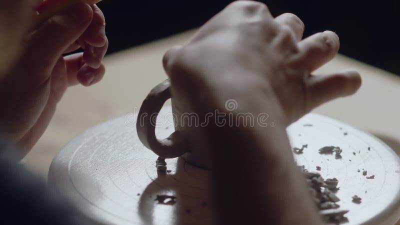 Close Up of Potter Using Tools To Making Ceramic Clay Bottom of Cup in ...