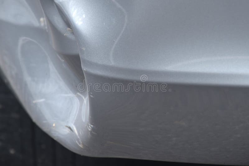 Pound and Scratch from Accident on Bumper of Silver Color Car ...