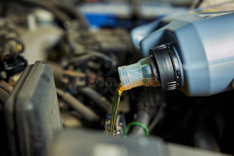 Close-up Pouring Oil into a Car Engine Stock Image - Image of cars ...