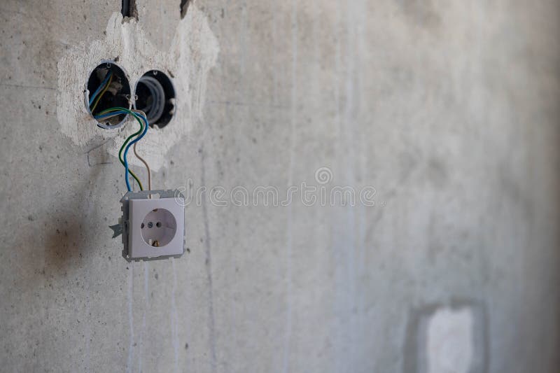 Close-Up of a Power Plug Connected To an Electrical Socket during ...