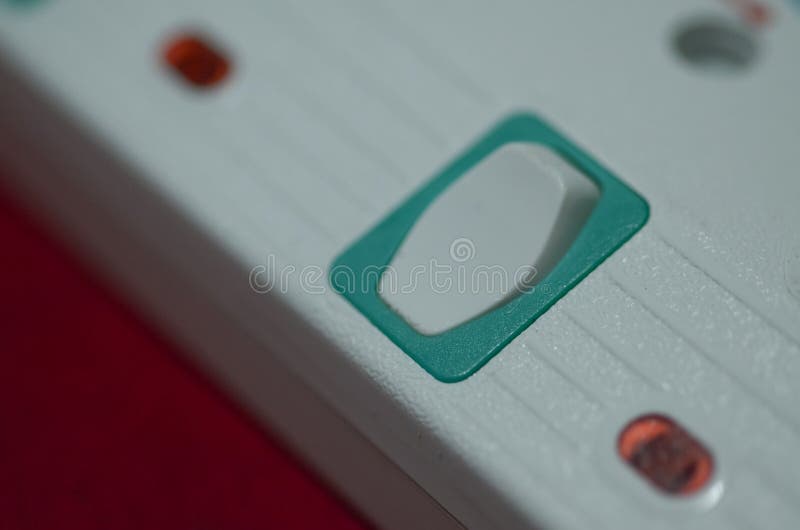 Close-Up of a Power Strip with White Switch and Green Border ...