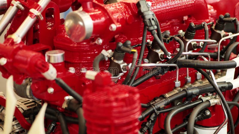 Close-up of a Powerful Red Combustion Engine Showing Complex Network of ...