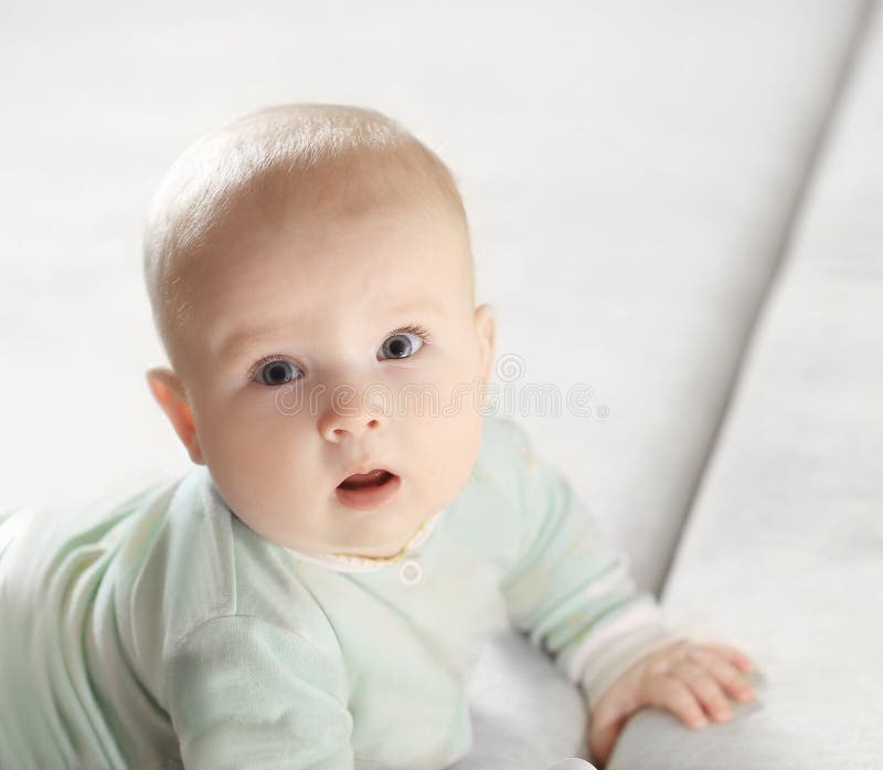 Close-up of a Pretty Little Baby Looking at the Camera.photo Wit Stock ...
