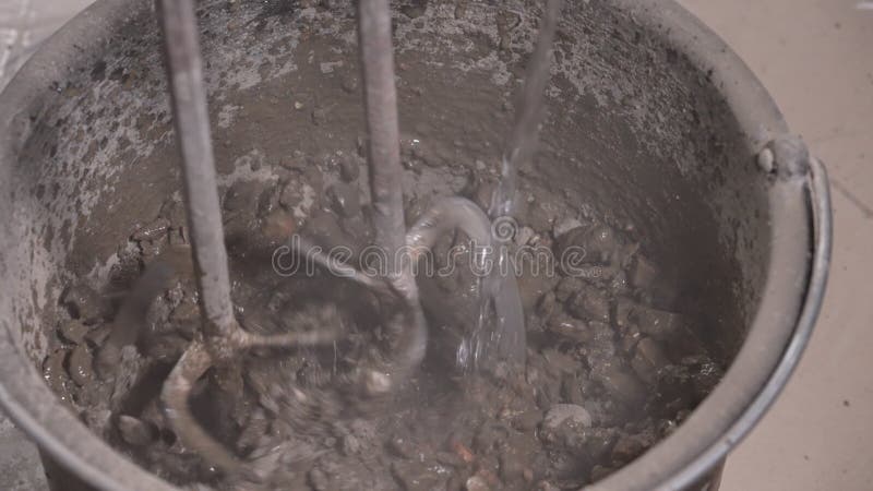Close-up of the Process of Kneading a Building Dry Mix of Crushed Stone ...