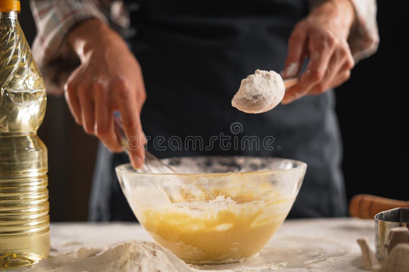Close-up Process of Making Dough for Cakes in Bowl on a Light Table ...