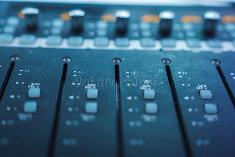 Close Up of Professional Audio Mixing Console with Faders and Knobs ...