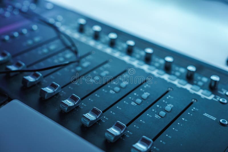 Close Up of Professional Audio Mixing Console with Sliders and Knobs ...