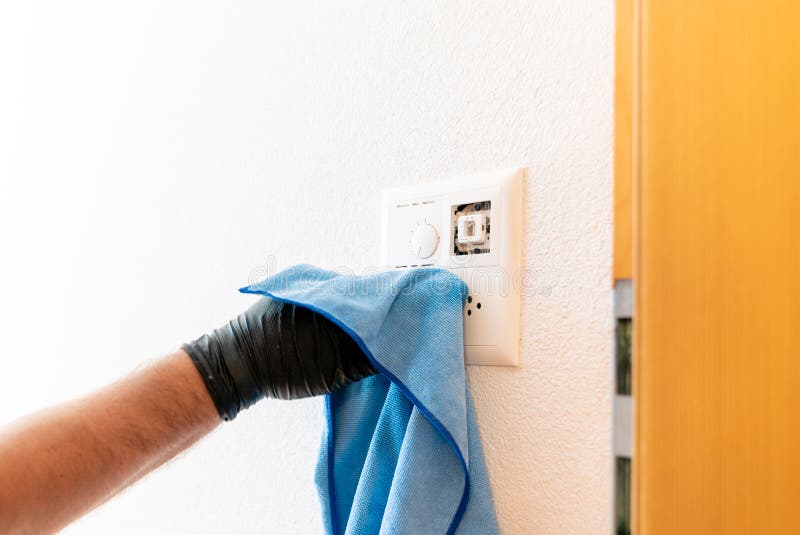 Close Up of a Professional Cleaner Cleaning a Modern Light Switch and ...