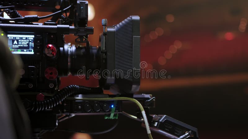 Close Up of Professional Digital Cinema Camera with Set of Light ...