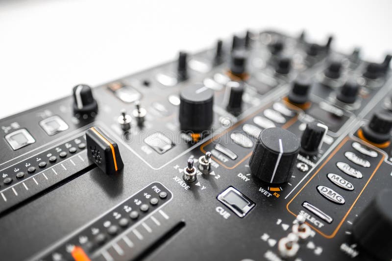 Close-Up of a Professional DJ Mixer with Sliders and Knobs for Audio ...