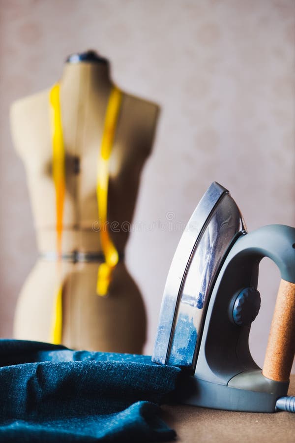 Close Up of Professional Iron in a Tailor`s Factory, Tailoring T Stock ...