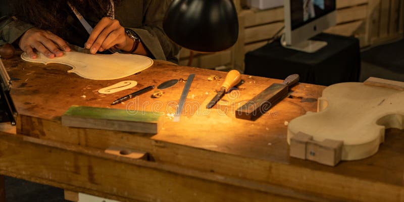Close-up of a Professional Master Artisan Luthier Working on the ...