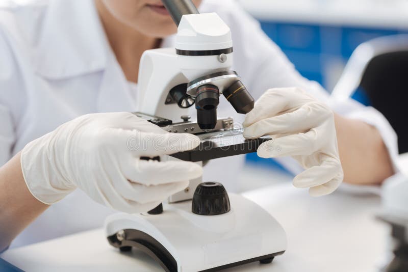 Close Up of a Professional Microscope Stock Photo - Image of person ...