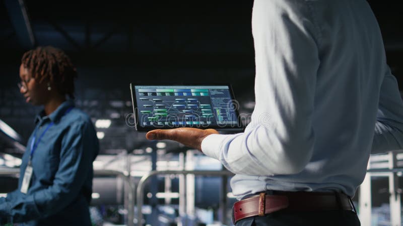 Close Up of Programmer Swiping on Tablet Display in Data Center, Checking Code Stock Video ...