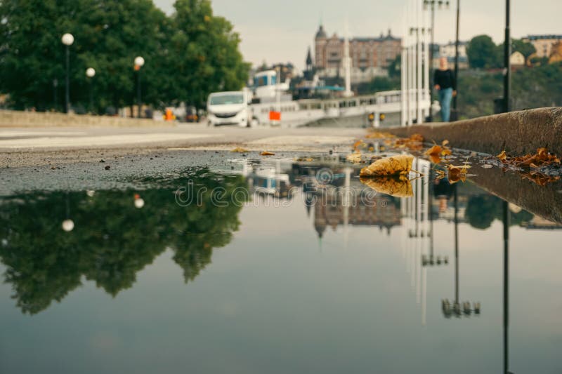 Close Up of a Puddle in the City Stock Image - Image of vehicle, urban ...