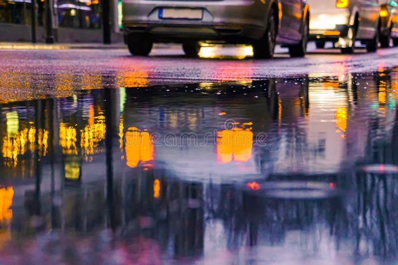 Close Up of a Puddle on a City Street Stock Photo - Image of reflection ...