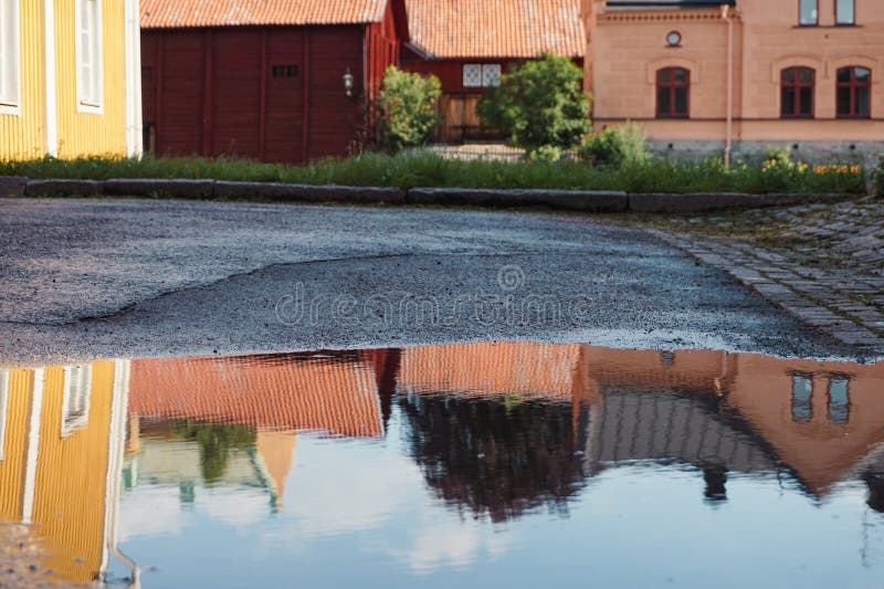 Close Up of a Puddle of Water on Asphalt Stock Photo - Image of water ...
