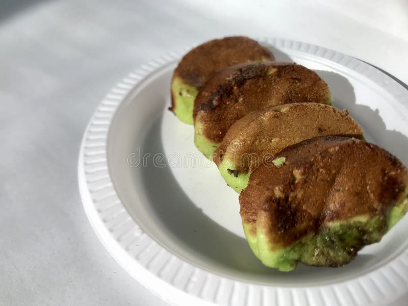 Close Up of the Pukis Pandan Set on Plate. Stock Image - Image of ...