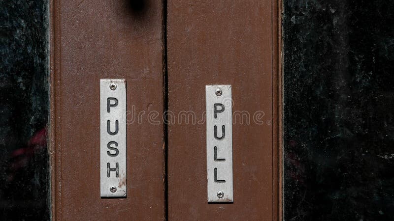 Close Up from Push and Pull Text on Doors Stock Image - Image of plates ...