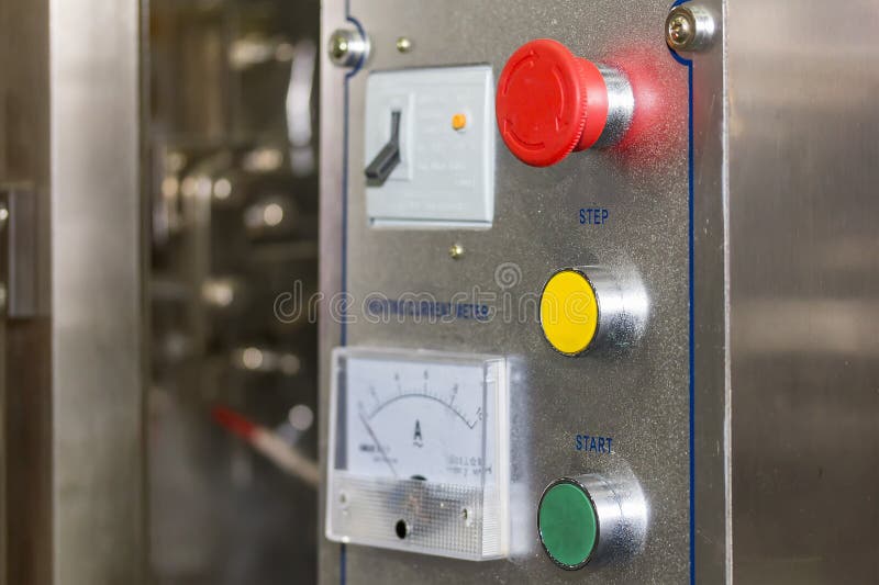 Close Up Emergency Stop Button on Control Panel of Machine for Safety ...