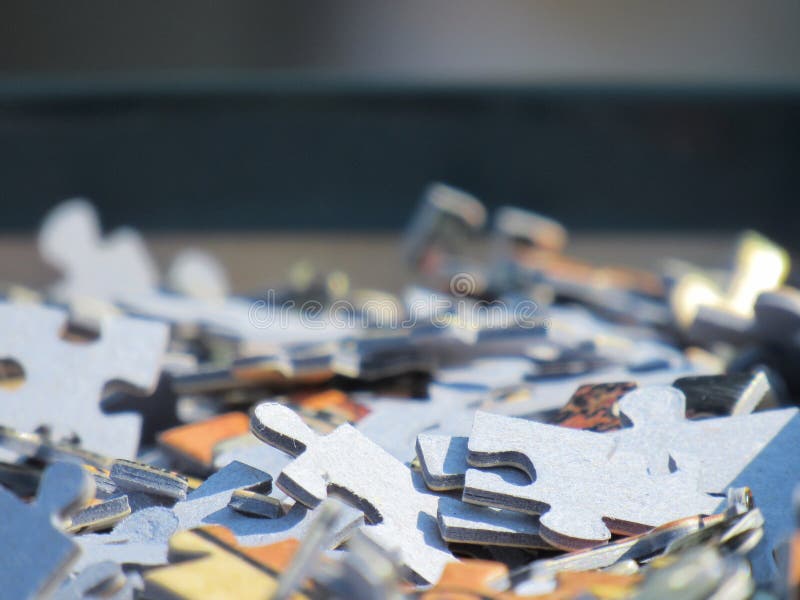 Close-up of Puzzle Pieces in a Box Stock Photo - Image of activity ...
