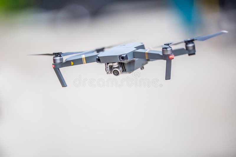 Close-up Quadcopter Drone with Camera Flying in Park Stock Photo ...