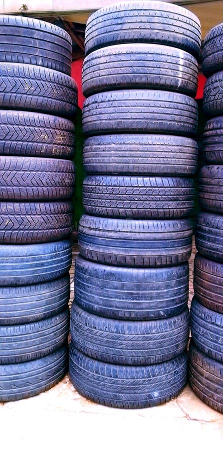 Close up of car tyres stock image. Image of motor, room - 299453219