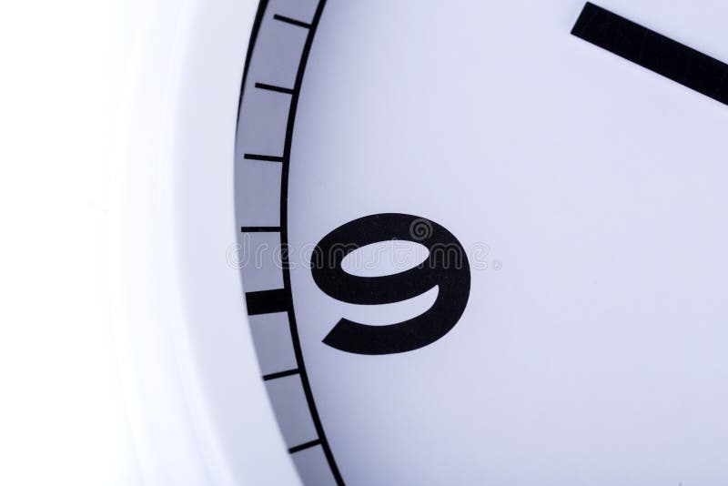 Close Up Quarter of an Analog Clock Showing the Hour of Nine Stock ...