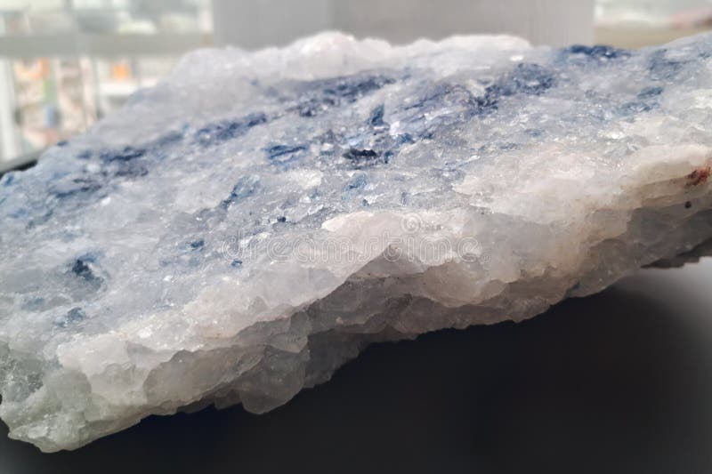 A Close-up of a Quartz Mineral with Blue Inclusions Stock Image - Image ...