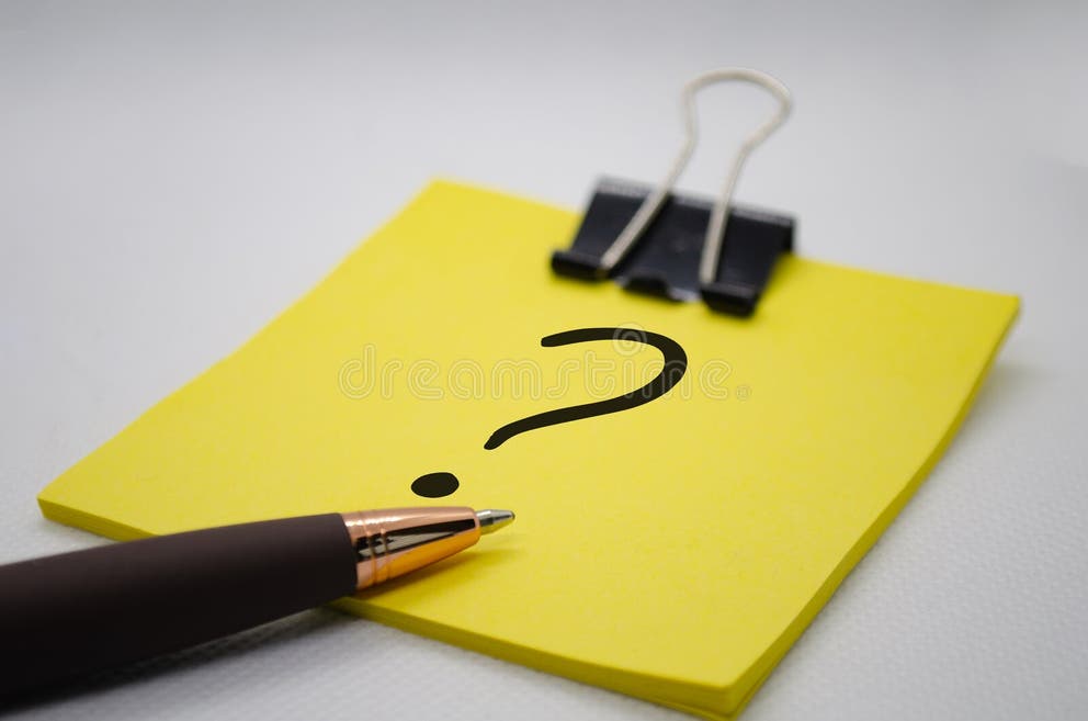 Close Up of Question Mark on Notepad with Pen on White Background ...