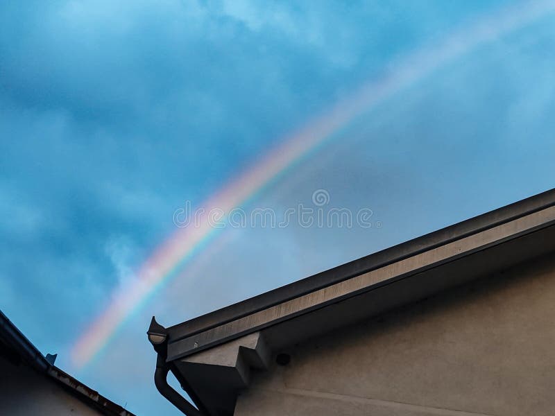 Close-up of a Rainbow in a Cloudy Sky Stock Photo - Image of skyview ...