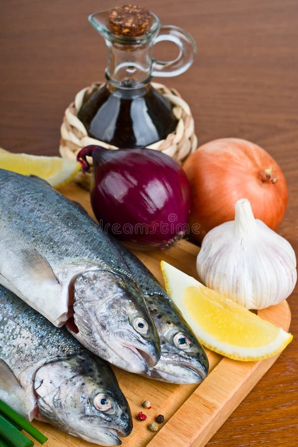 Close-up Raw Fish Trout on Wooden Board Stock Image - Image of ...