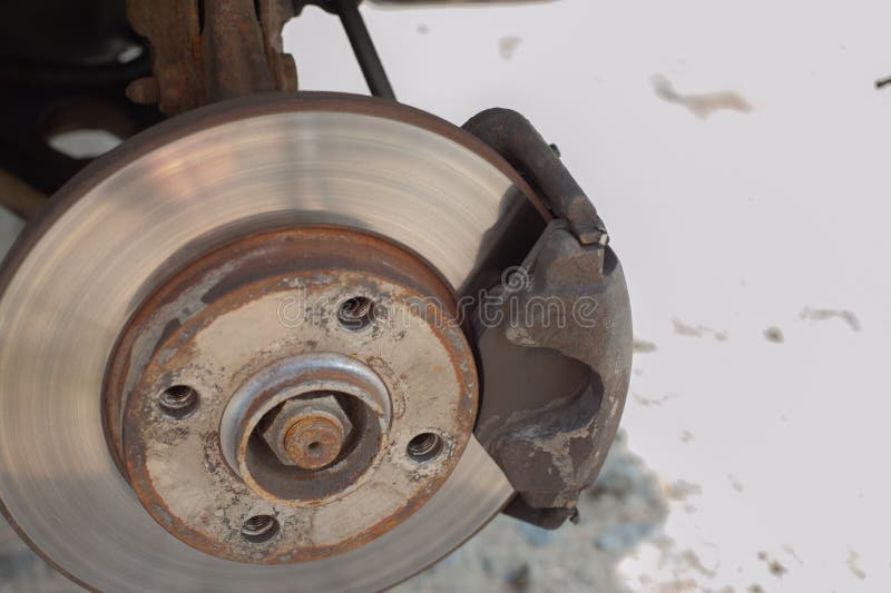 Close Up Rear Brake Caliper and Disk with Jack Kit of Car Service Tool ...