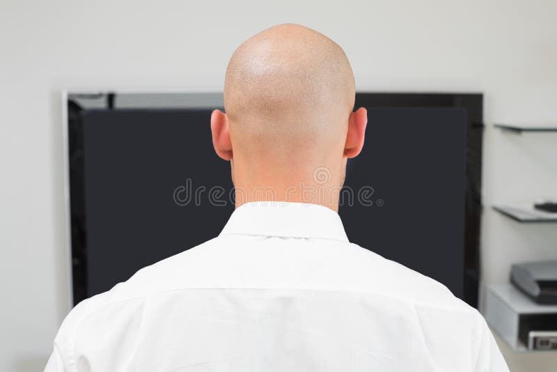 Close Up Rear View of a Bald Man Using Computer Stock Photo - Image of ...