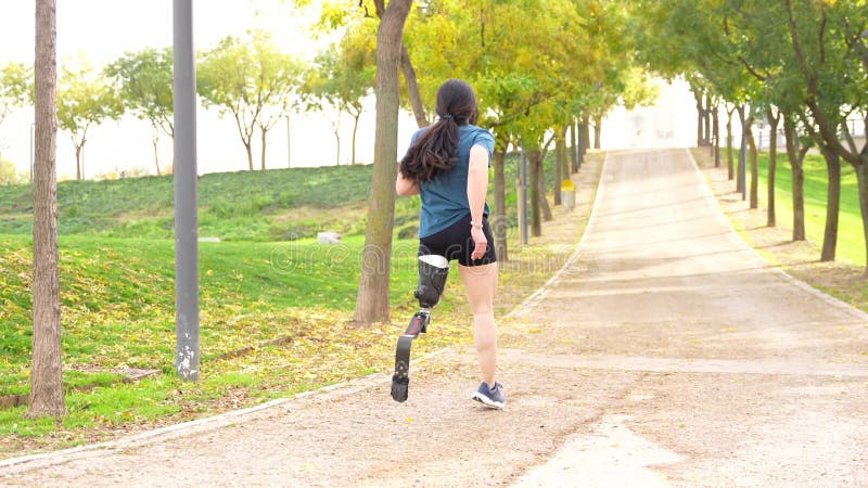 Close-up of a Disabled Man with Prosthetic Leg Running Outdoors Stock ...