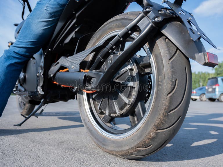 Close-up of the Rear Wheel with the Engine of an Electric Motorcycle ...