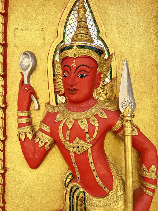 Red Angle Statue on Gold Wall Editorial Photo - Image of sculpture ...