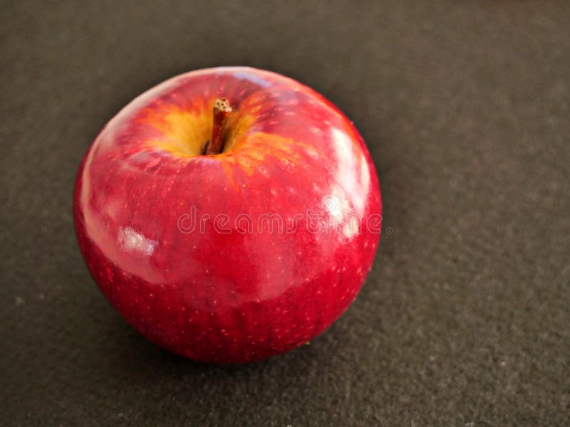Close up on a red apple stock image. Image of object - 379952379