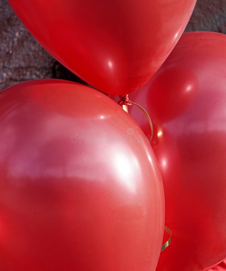 Close up of red balloons stock photo. Image of tints - 289179284