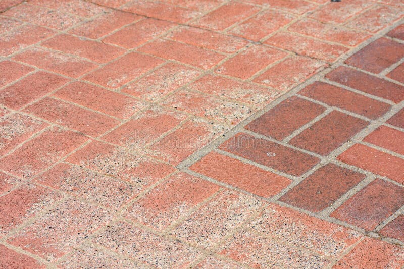 Close-up of Red Brick Pavement with a Mix of Weathered and Newer Bricks ...