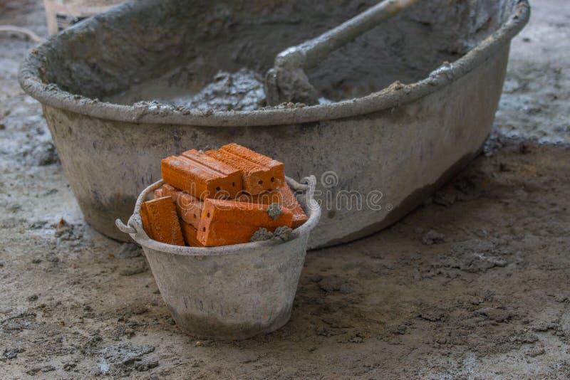 Red Brick in Plastic Bucket on Construction Wall Site Stock Photo ...
