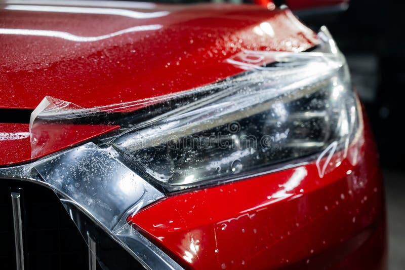 Close-up of a Red Car Headlight with Vinyl Wrap. Stock Image - Image of ...