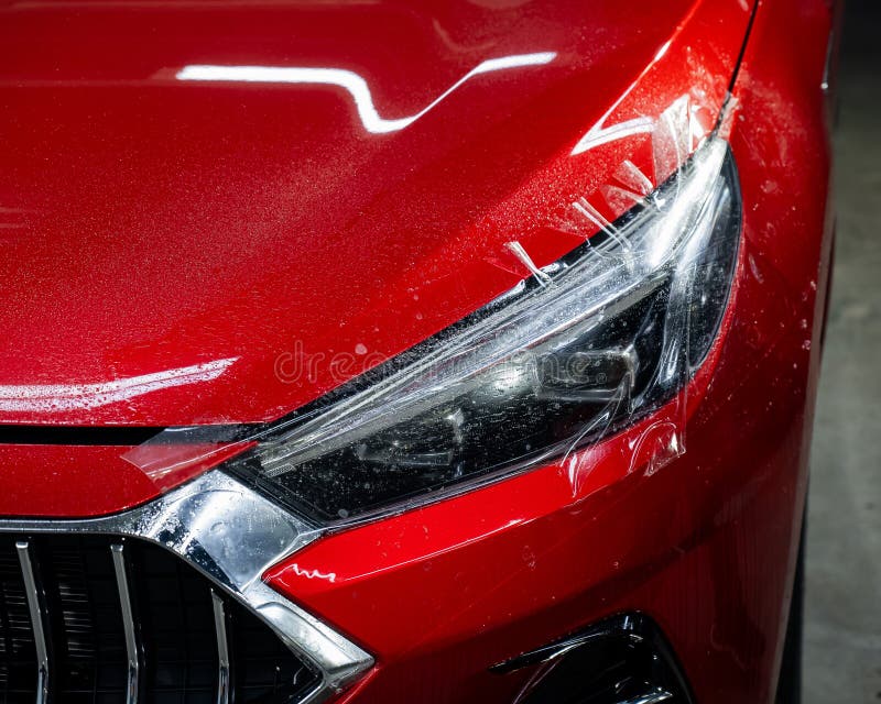 Close-up of a Red Car Headlight with Vinyl Wrap. Stock Image - Image of ...