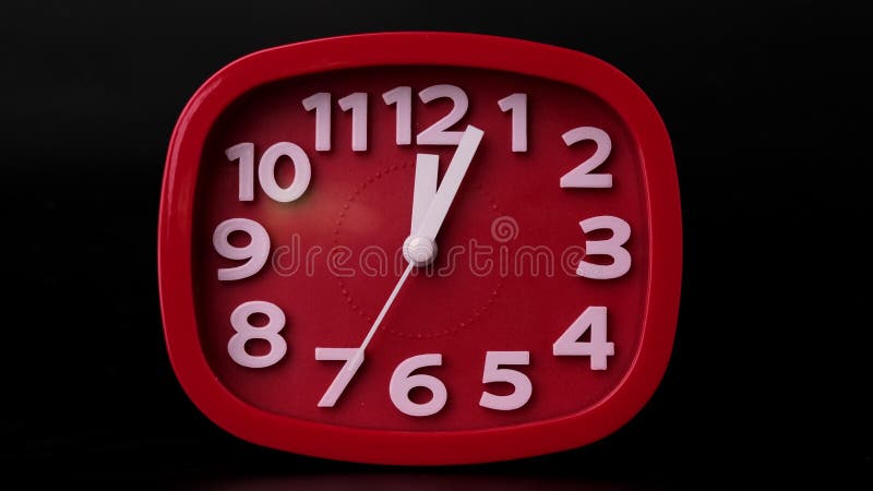 Close-up of Red Clock Time Lapse on Black Background. the Hands of the ...